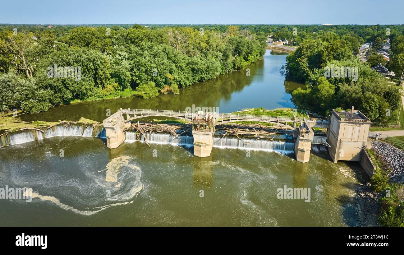 Maumee River Dam aerial with swirling basin below waterfalls chocked by ...