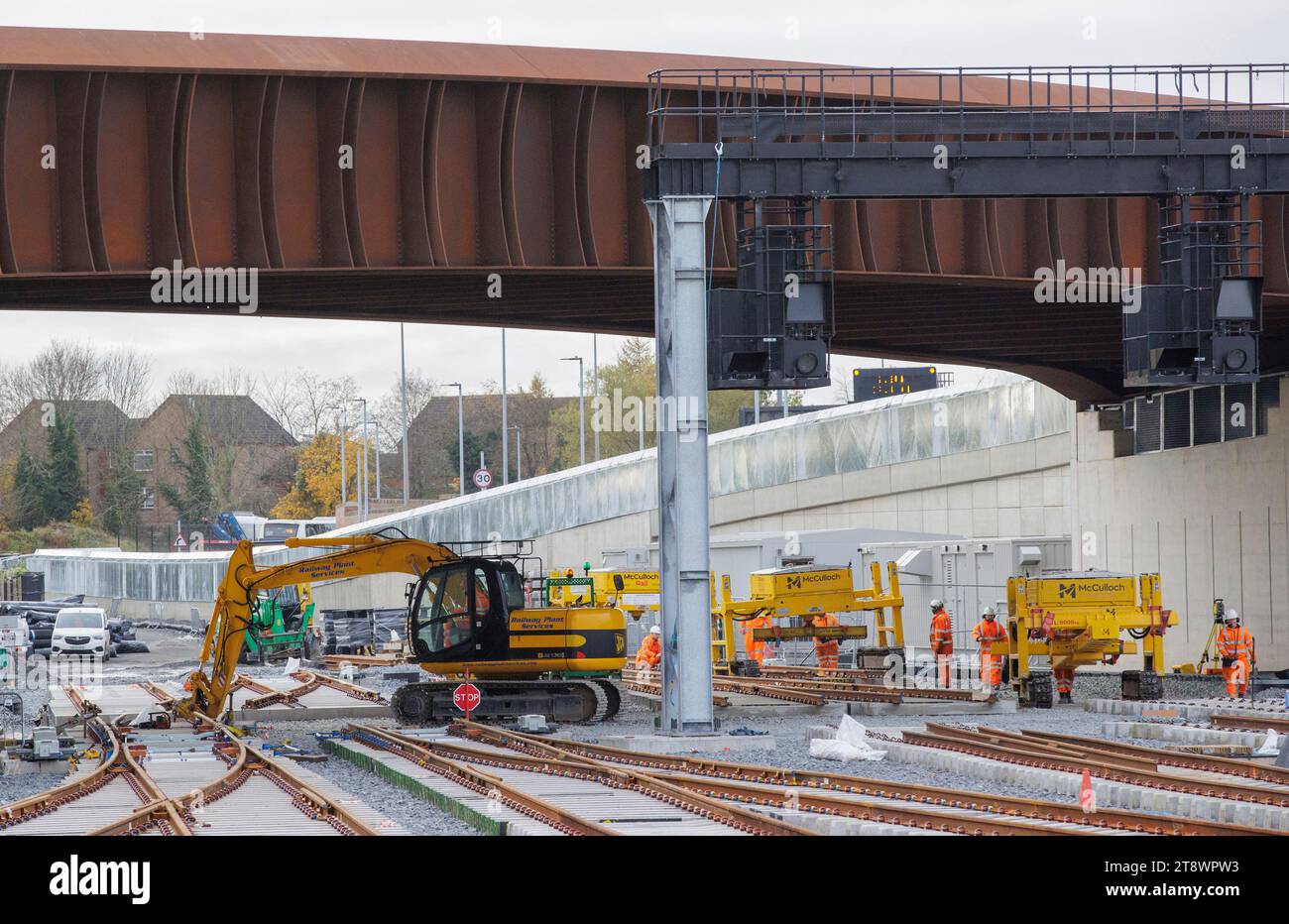 Workers building new train lines at the construction site for the new ...