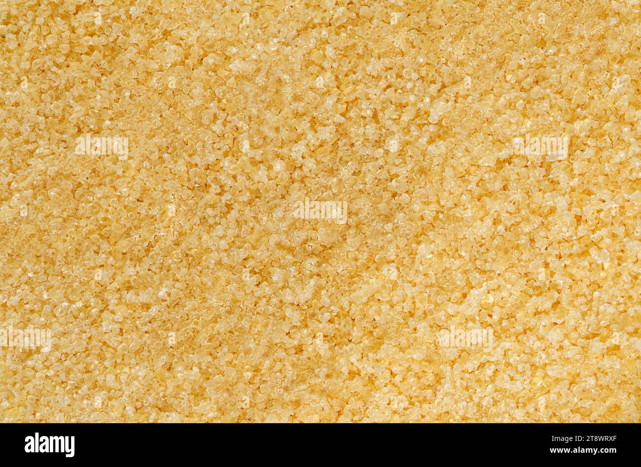 Gelatin, yellow granules, background uniform texture, bunch in bulk ...