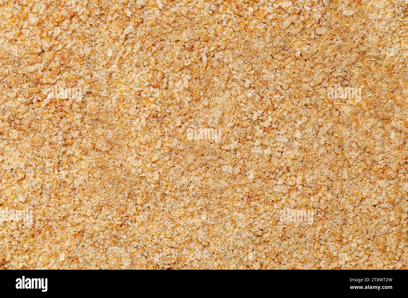 Breadcrumbs, crushed dried bread, background uniform texture, bunch in ...