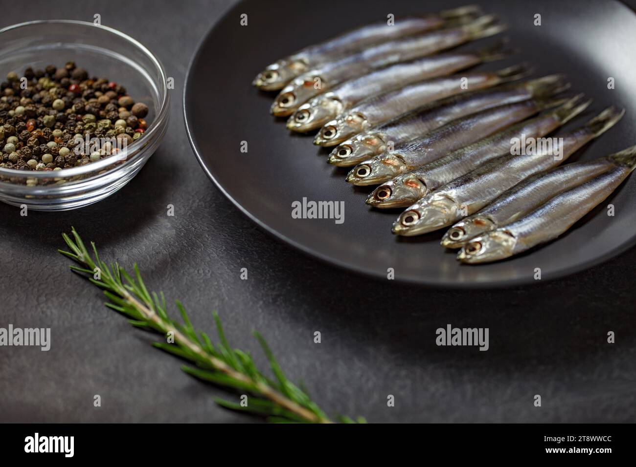 Anchovy european, hamsa fresh, several small fish rosemary and pepper ...