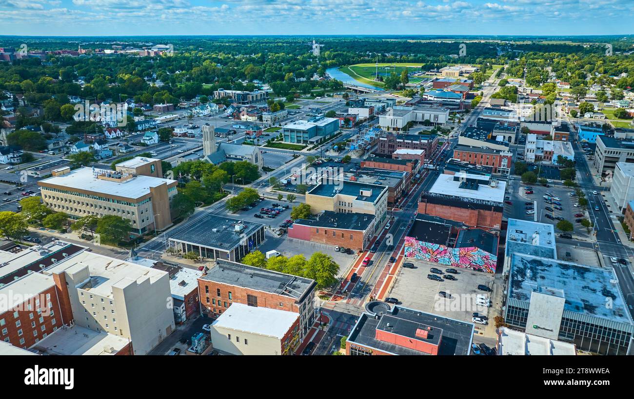 Midwest city, Muncie, IN aerial of downtown buildings with abstract ...