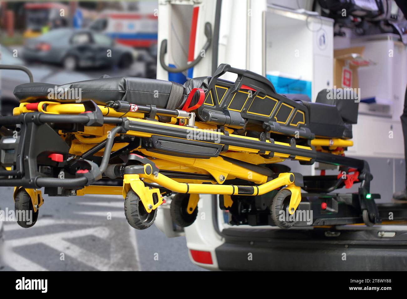 First aid stretcher and ambulance at road accident Stock Photo - Alamy