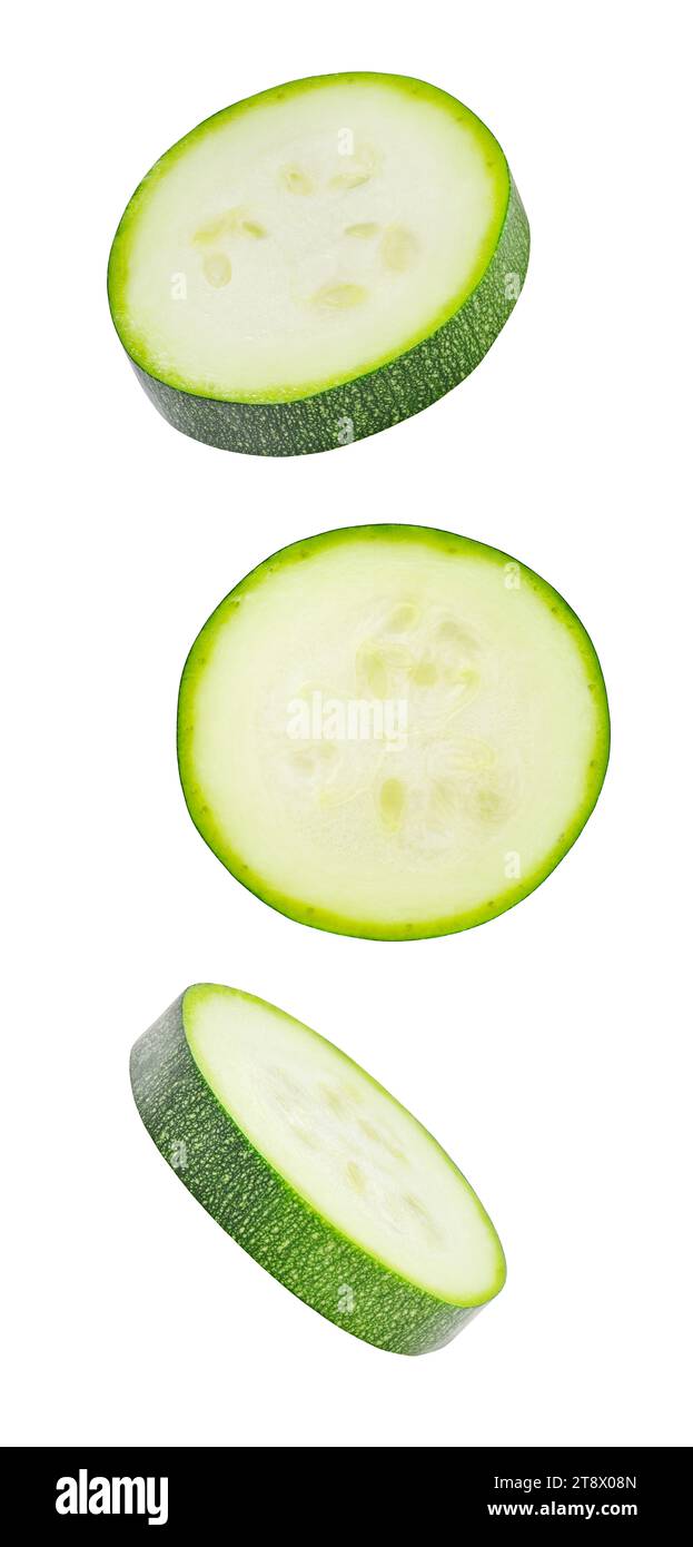 Zucchini, sliced round pieces, falling, hanging, flying, soaring ...