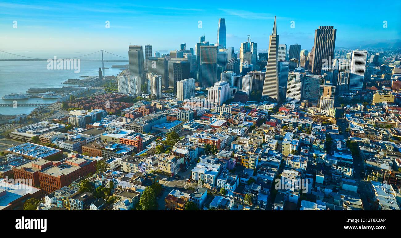 San Francisco golden light on city from aerial above buildings with ...