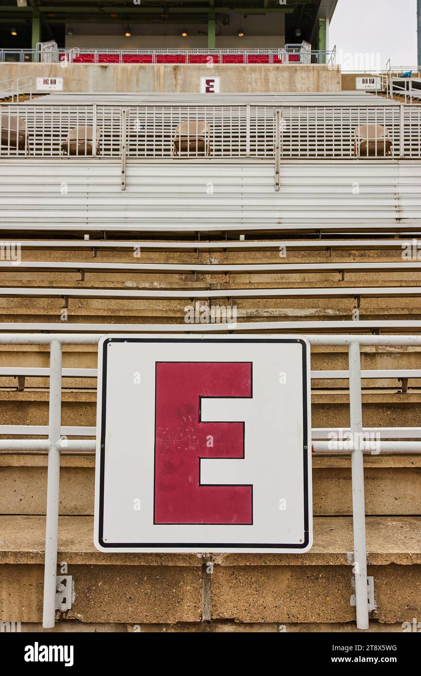 E section of empty stands at sports stadium under gloomy sky on ...