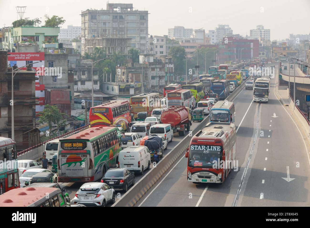 Dhaka, Bangladesh. 21st Nov, 2023. Numerous vehicles jam on a street in ...