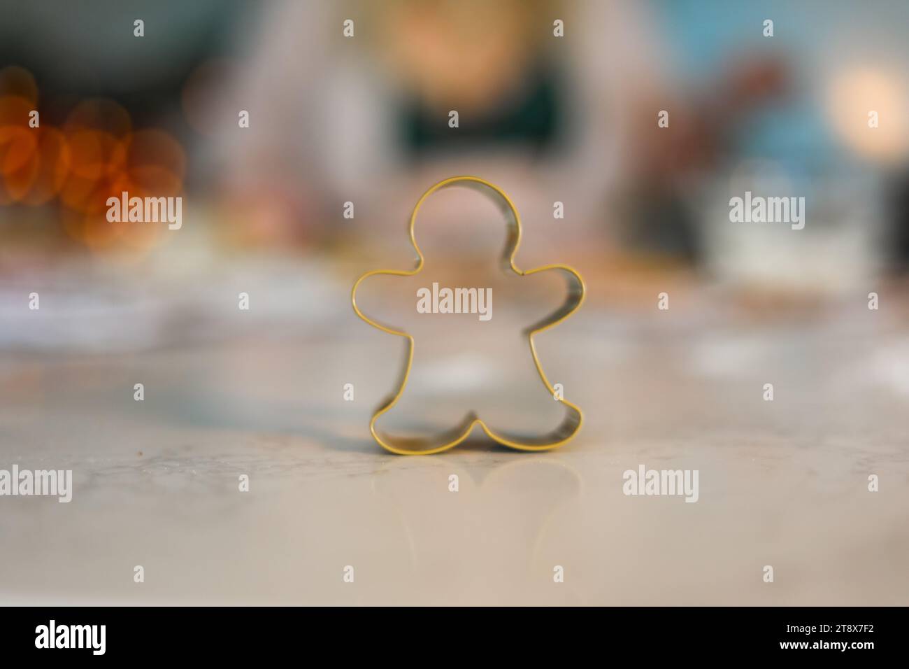 A close-up image of a gingerbread man on a kitchen countertop Stock ...