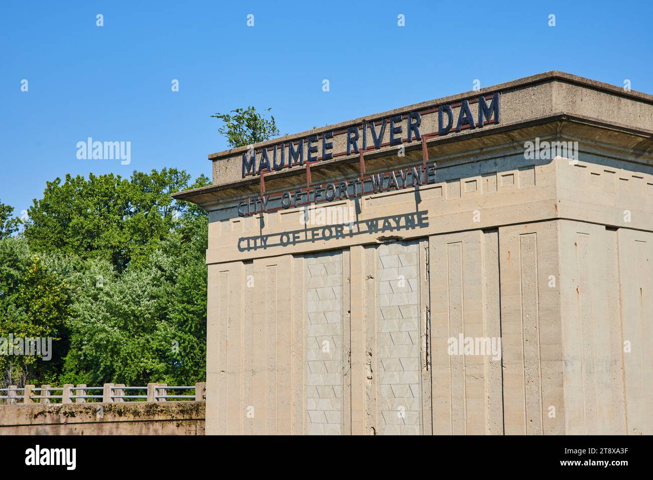 Maumee River Dam City of Fort Wayne sign on building on blue sky day in ...