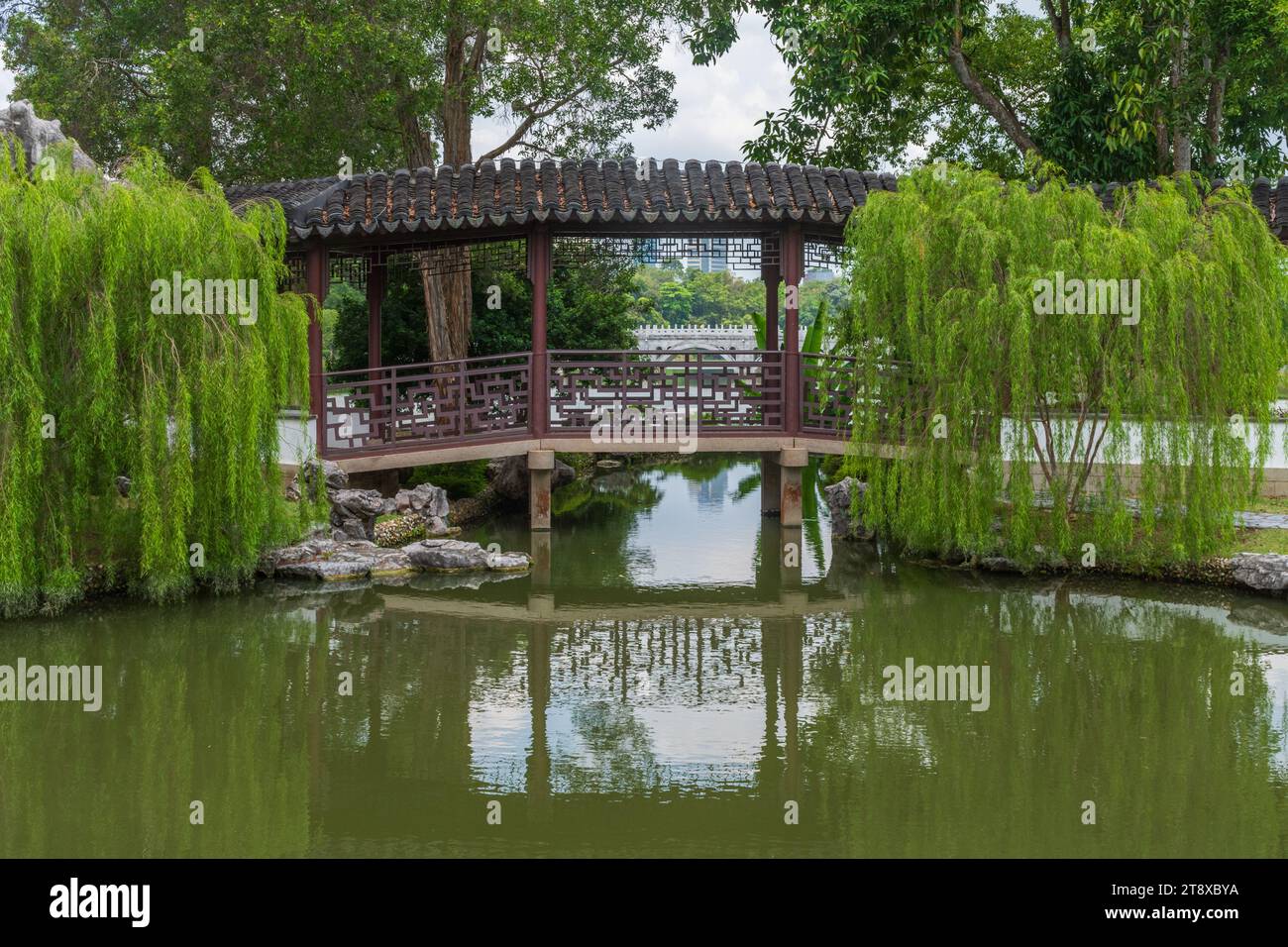 Jurong Lake Gardens, Singapore - March 17th 2018: A footbridge over ...