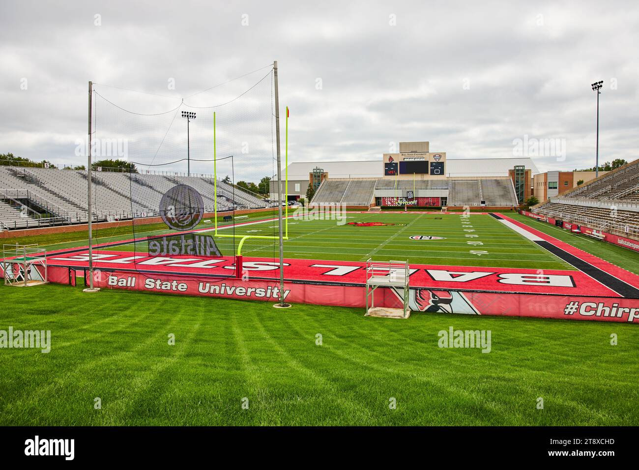 Scheumann Stadium lush green grass, empty stadium seating, and yellow ...