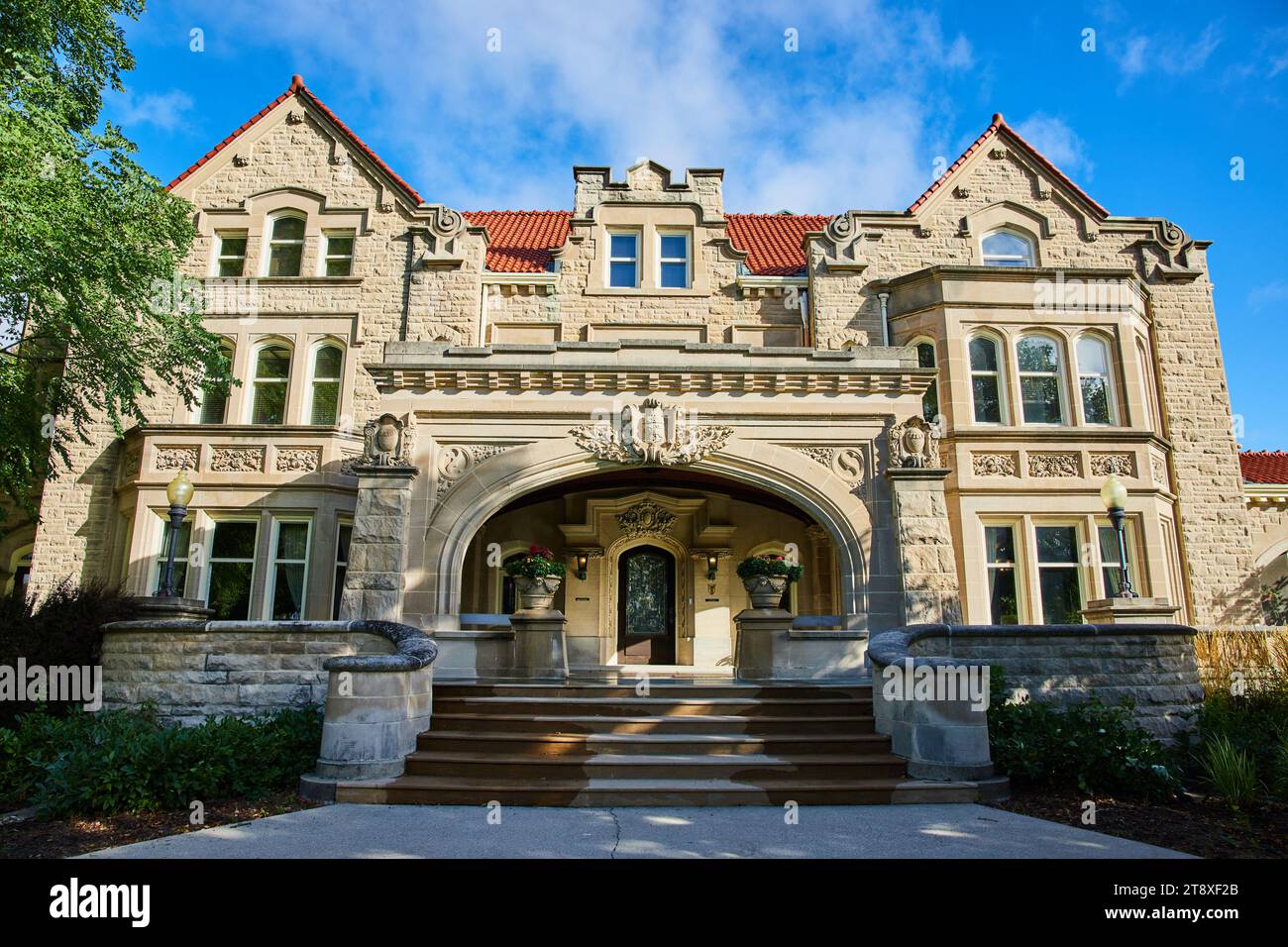Entrance Minnetrista Museum and Gardens mansion building under cloudy ...