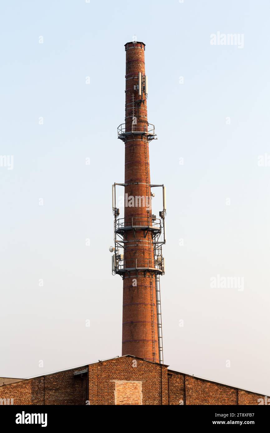 Base transceiver station on the old brick chimney Stock Photo - Alamy