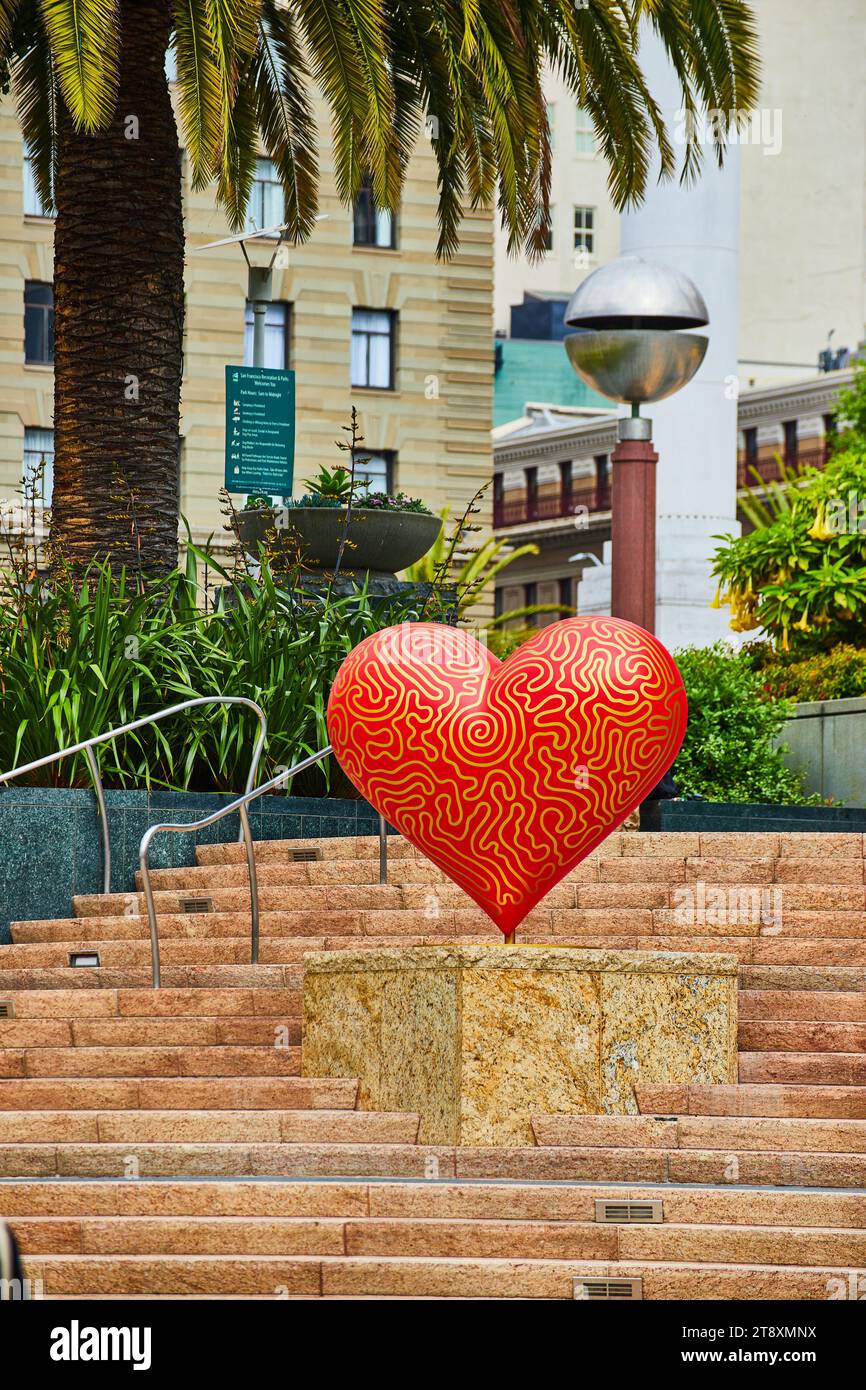 Red heart with yellow techno lines art on stairs in Union Square San ...