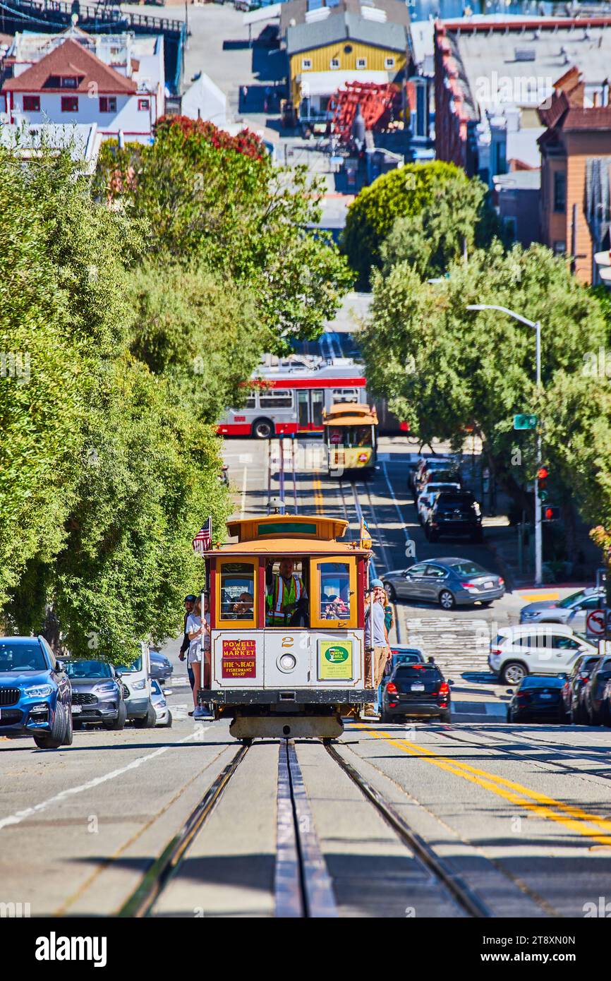 Trolley driving up hill with streetcar on bottom of hill and Clean Air ...