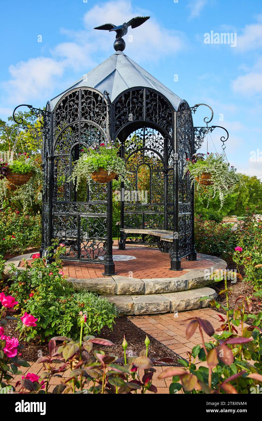 Black garden gazebo with brick path and bird at Minnetrista Museum and ...