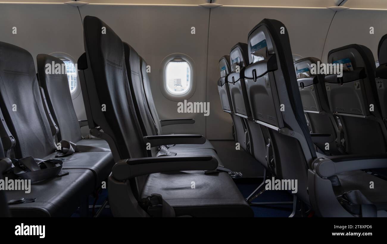 Empty economy seats inside the budget airline cabin Stock Photo - Alamy