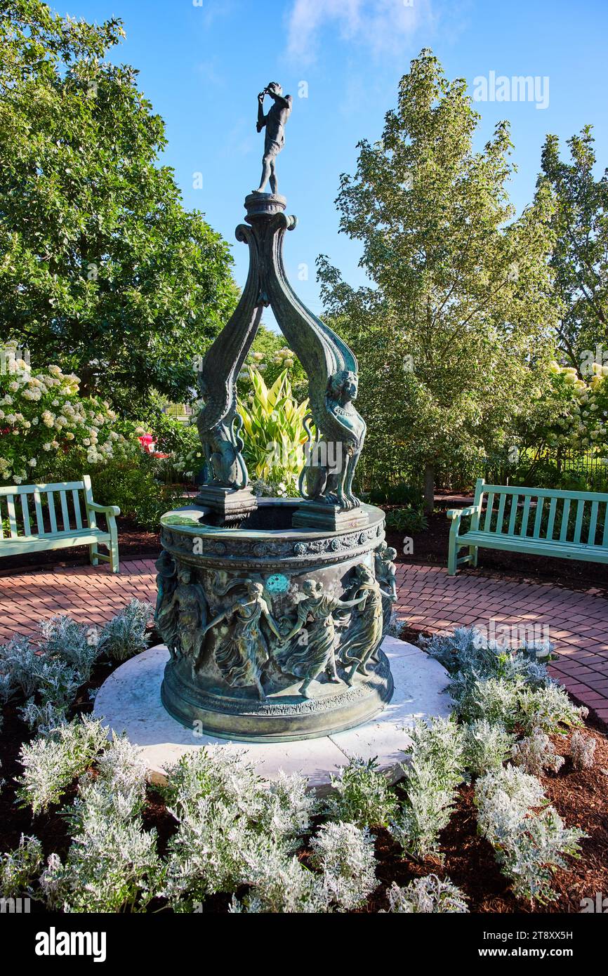 Copper statue in circular brick path in garden, Minnetrista Museum and ...