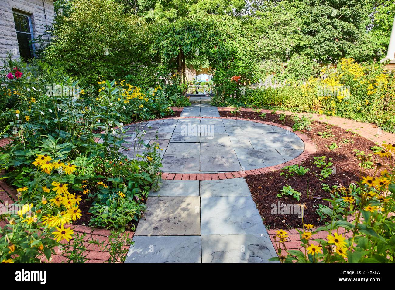 Minnetrista Museum and Gardens circle path with yellow daisy flowers ...