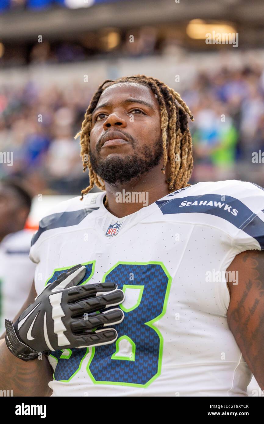 Seattle Seahawks guard Damien Lewis (68) stands for the National Anthem ...