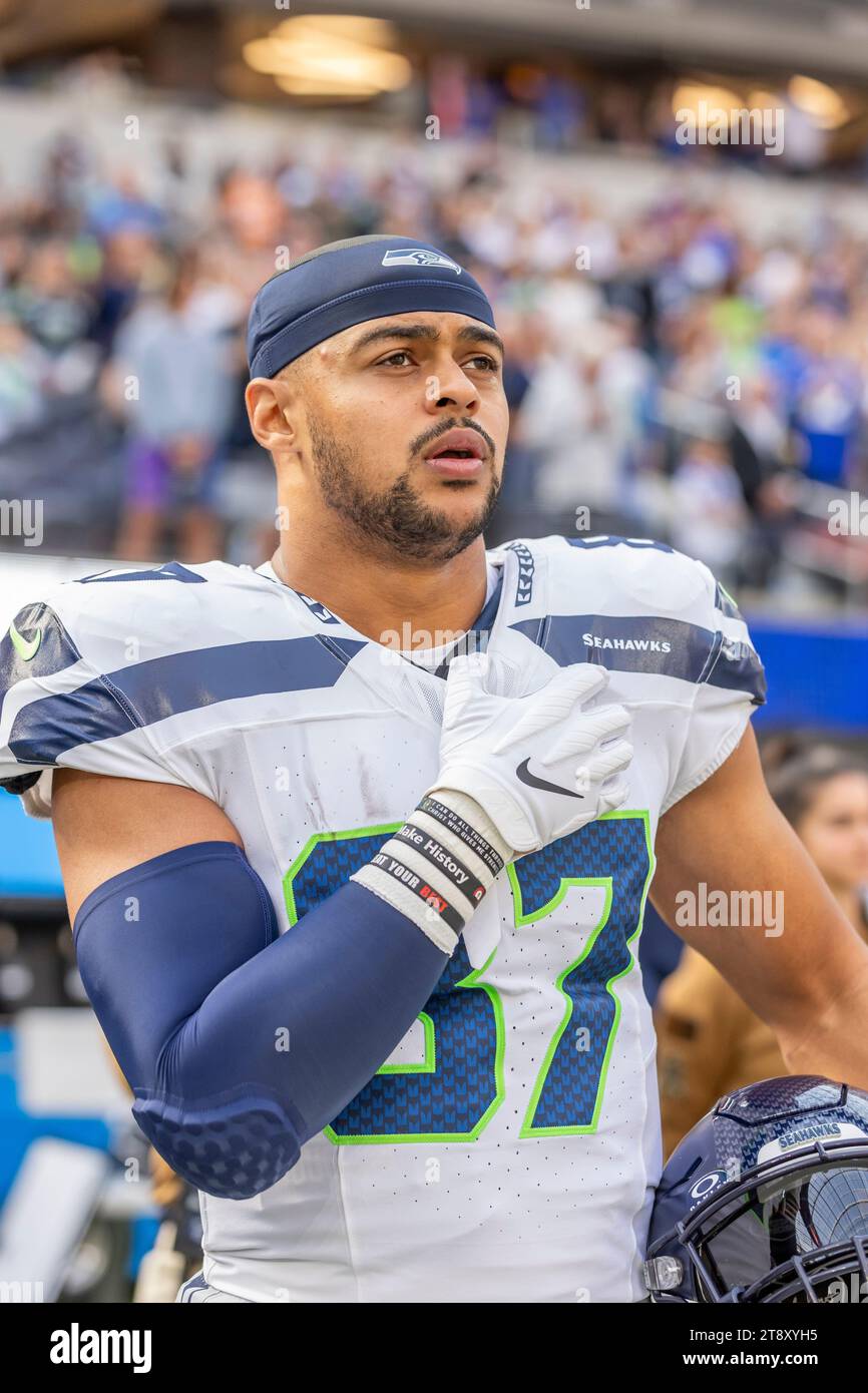 Seattle Seahawks tight end Noah Fant (87) stands for the National ...