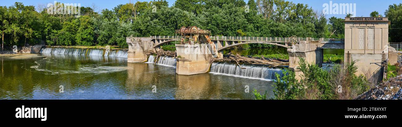Maumee River Dam panorama of logs clogging waterfall and forest ...