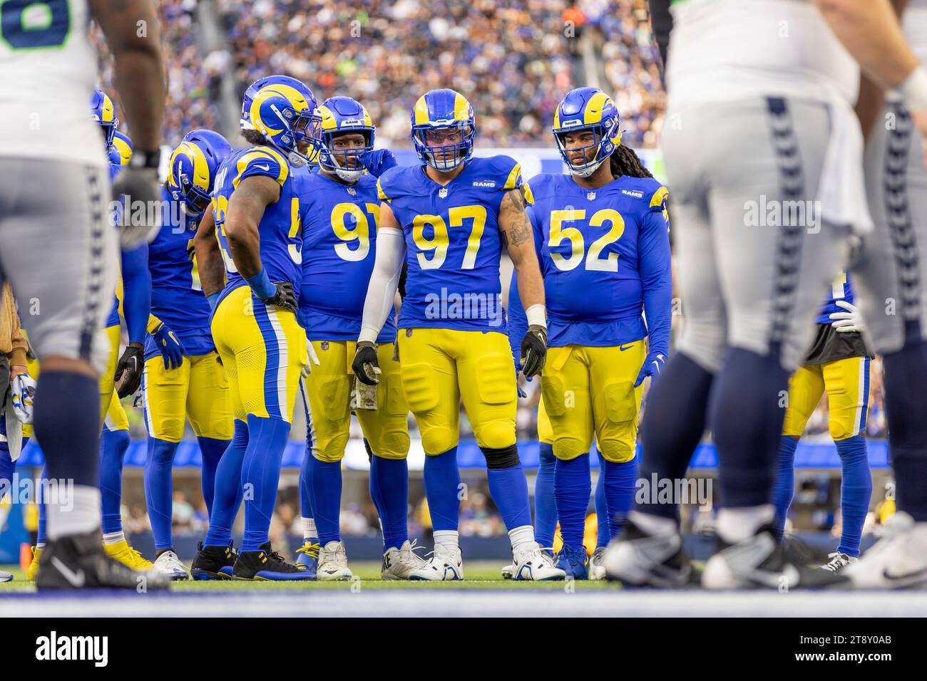 Los Angeles Rams linebacker Michael Hoecht (97) huddles with the ...