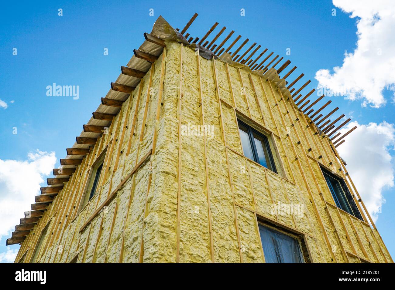 The facade of the residential house sprayed with a layer of ...