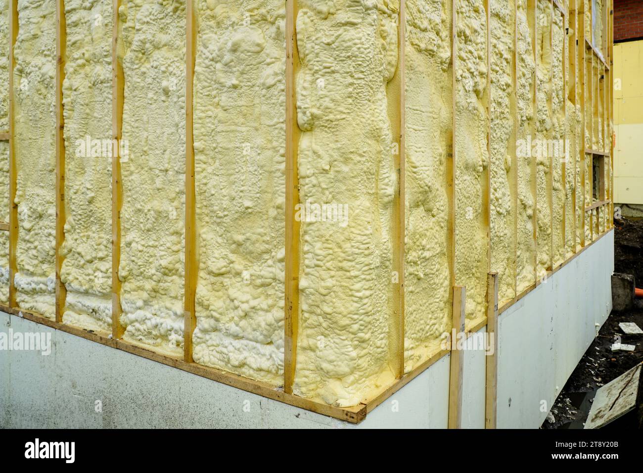 The facade of the residential house sprayed with a layer of ...