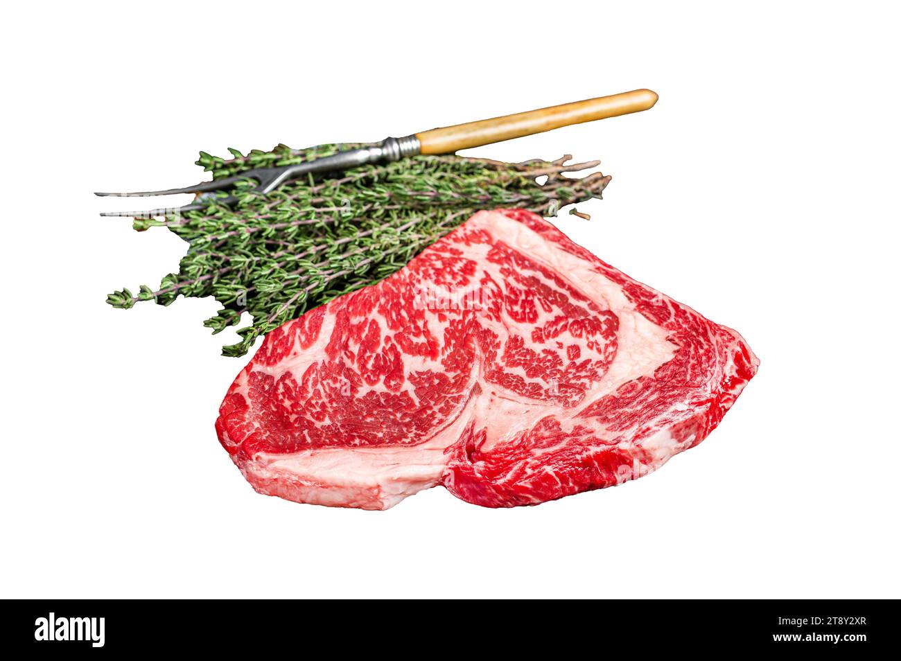 Black Angus Rib Eye steak, raw marbled beef meat with herbs. Isolated ...
