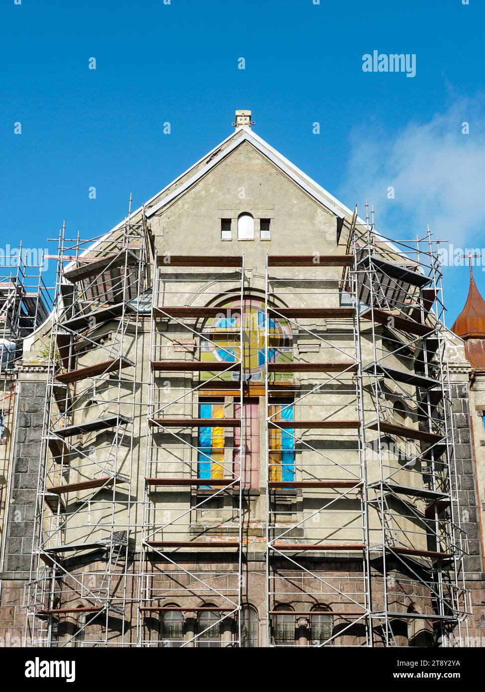 Repair of the facade and roof of an old Lutheran stone church using ...