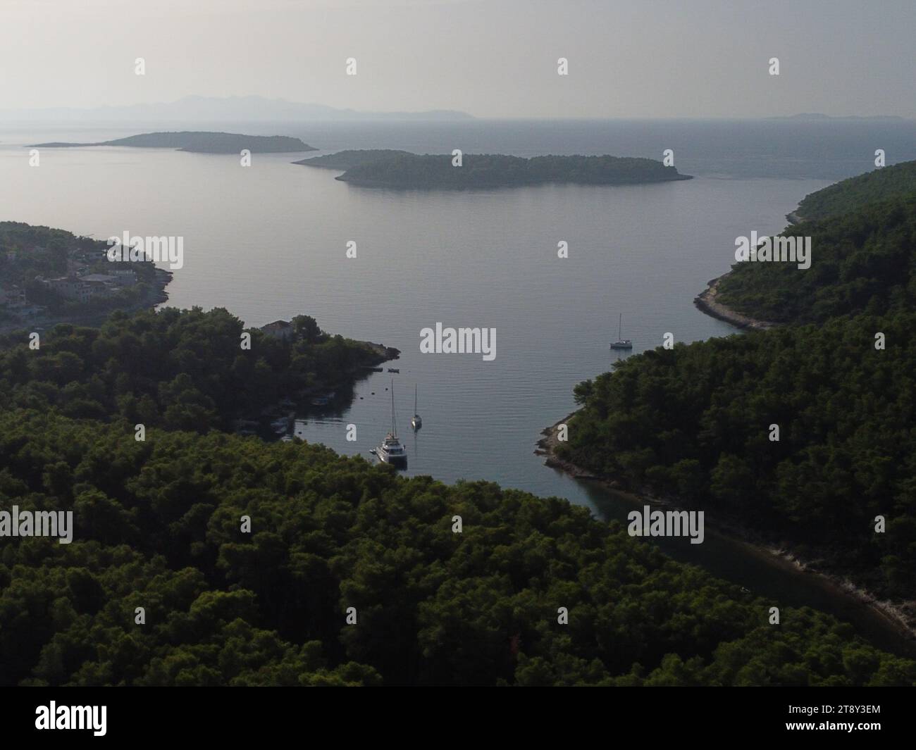 A majestic tall ship is sailing across a vast expanse of ocean, its ...