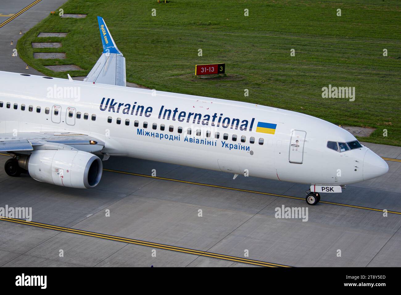 Close-up photo of Ukraine International Airlines Boeing 737-900 taxiing ...
