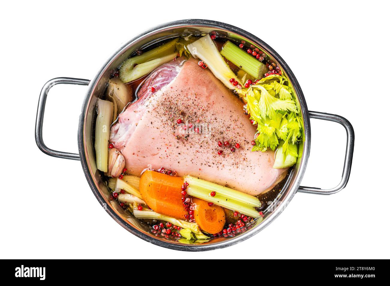 Cooking of Eisbein from Raw pork Hock ham, shank with vegetables and ...