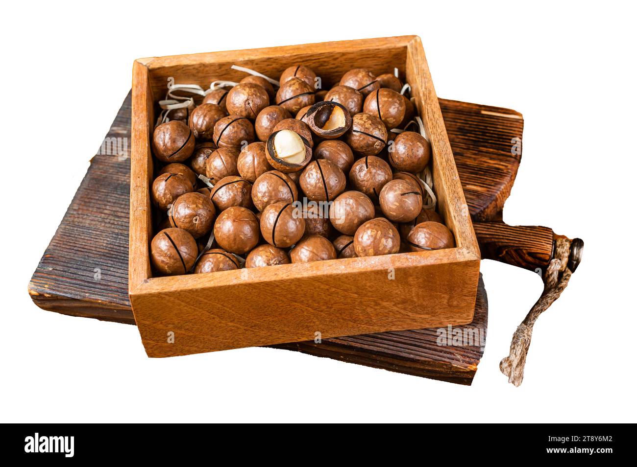Macadamia natural nuts in a box. Isolated, white background Stock Photo ...