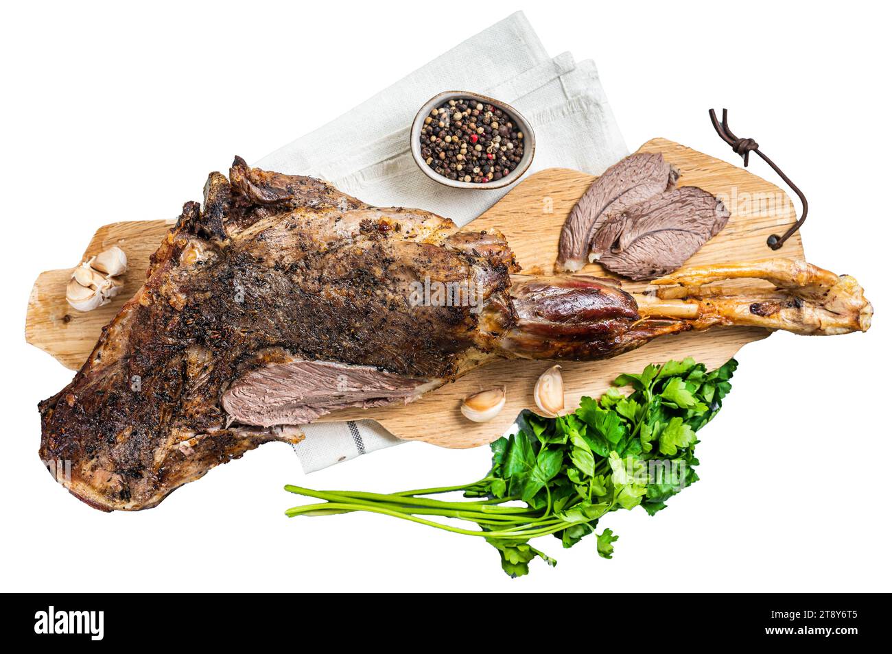 Whole roast mutton lamb leg with spices on a wooden board. Isolated ...