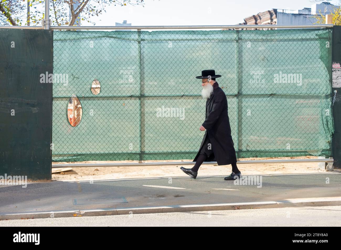 A Williamsburg, Brooklyn street scene. An older man, likely a Satmar ...