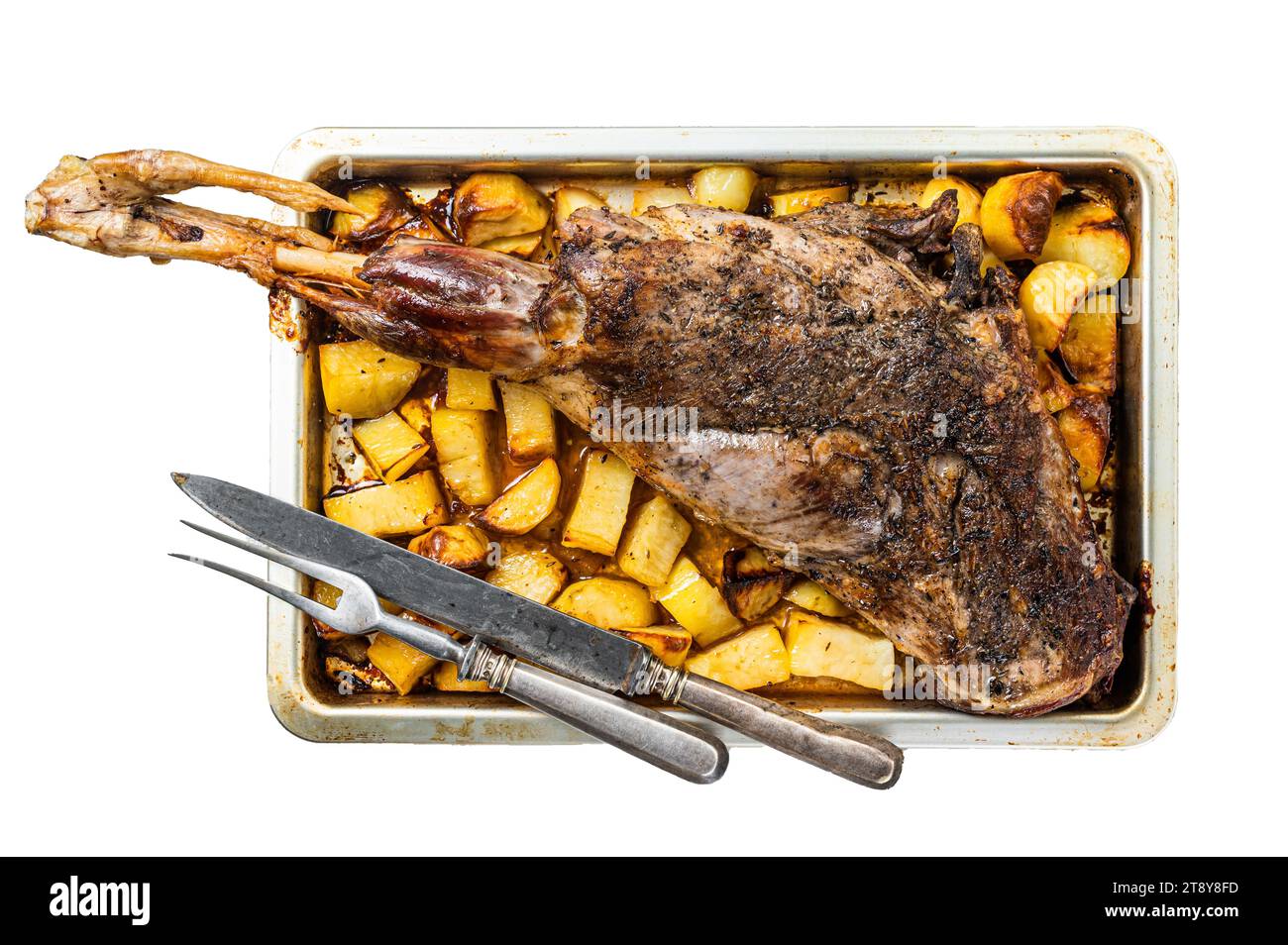 Roast lamb mutton leg with potatoes and rosemary in baking dish ...