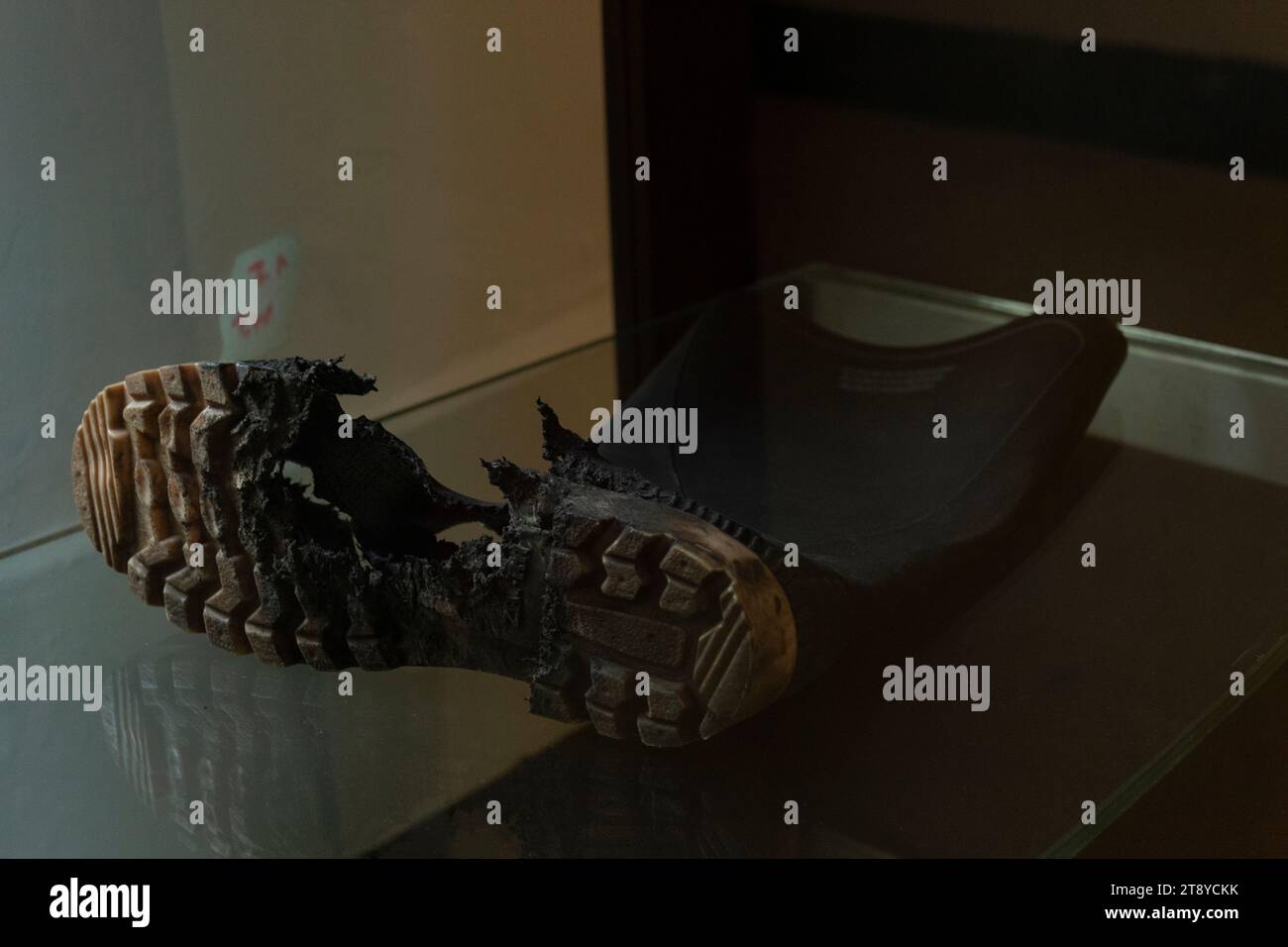 Damaged boot of a person who took a step over a anti personnel land ...