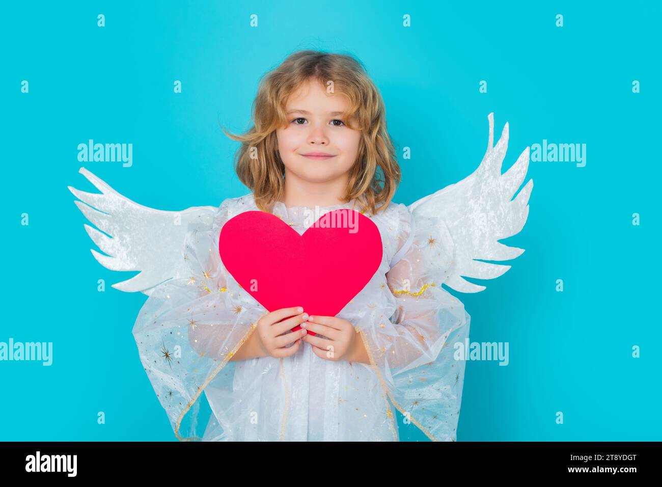 Angel child with heart. Beautiful little angel. Isolated studio shot ...