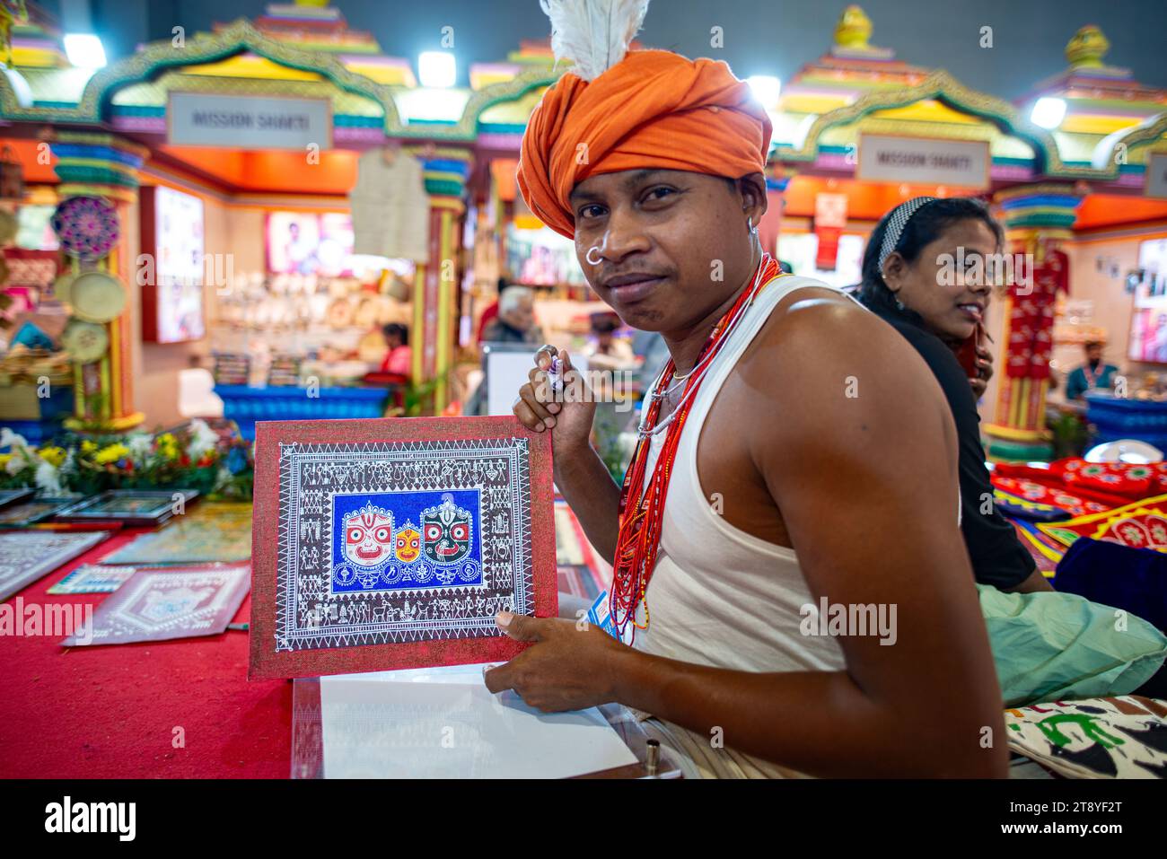 An artisan demonstrates Lanjia Saura painting work (Lanjia Saura ...