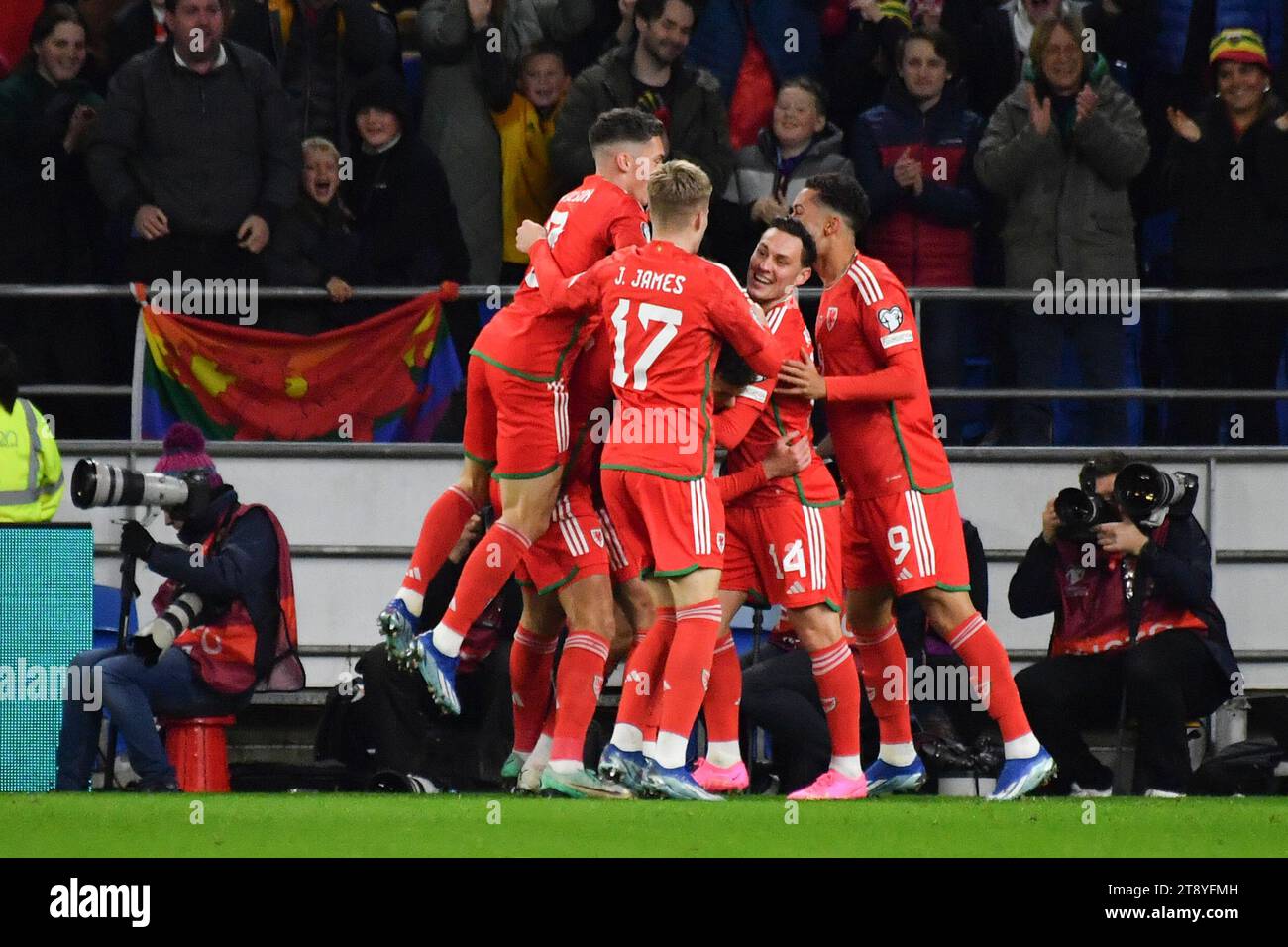 Welsh players celebrate teammate Neco Williams first goal during the ...