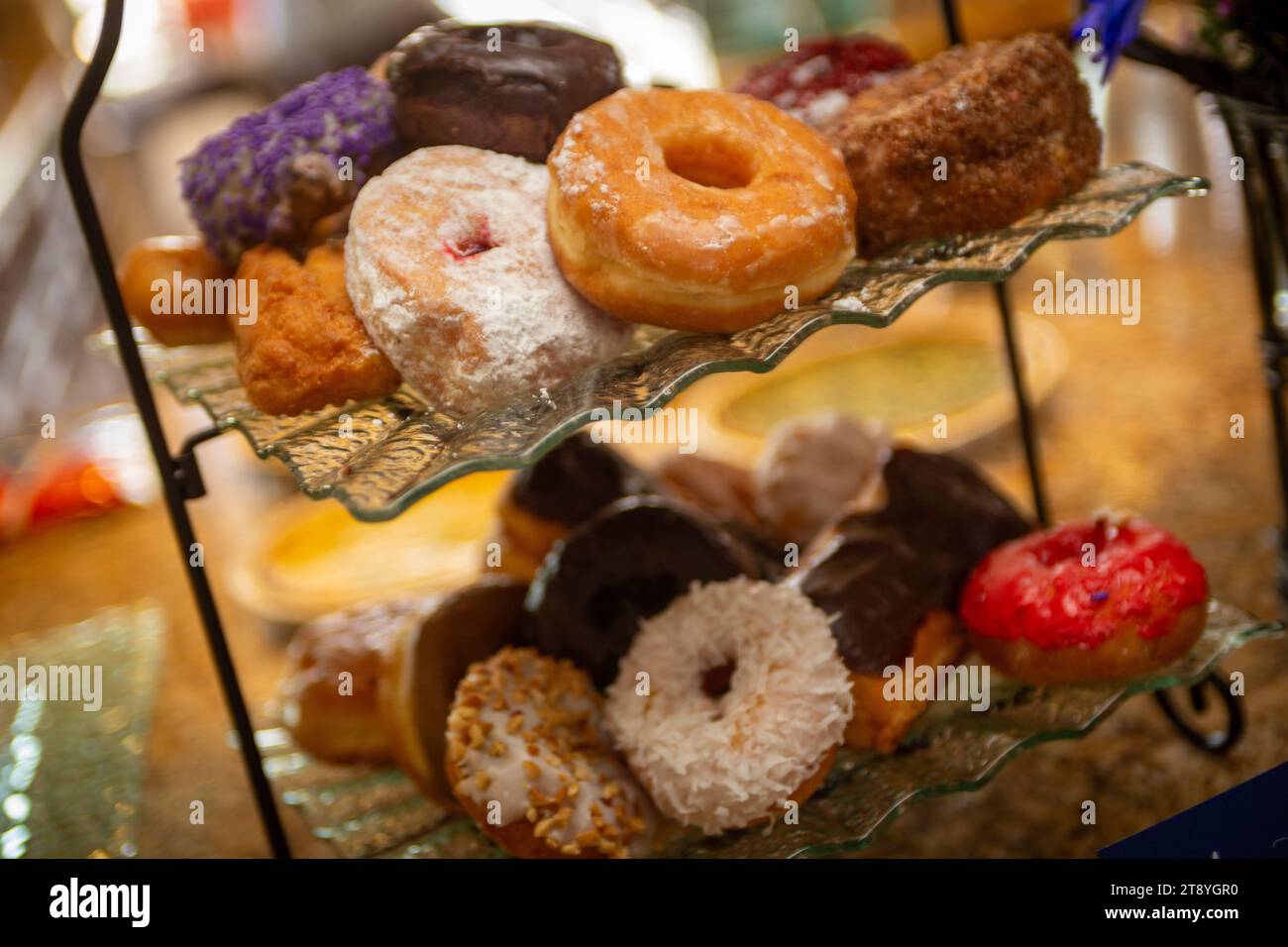 Stacked Variety of Donuts on a Serving Tier Stock Photo - Alamy