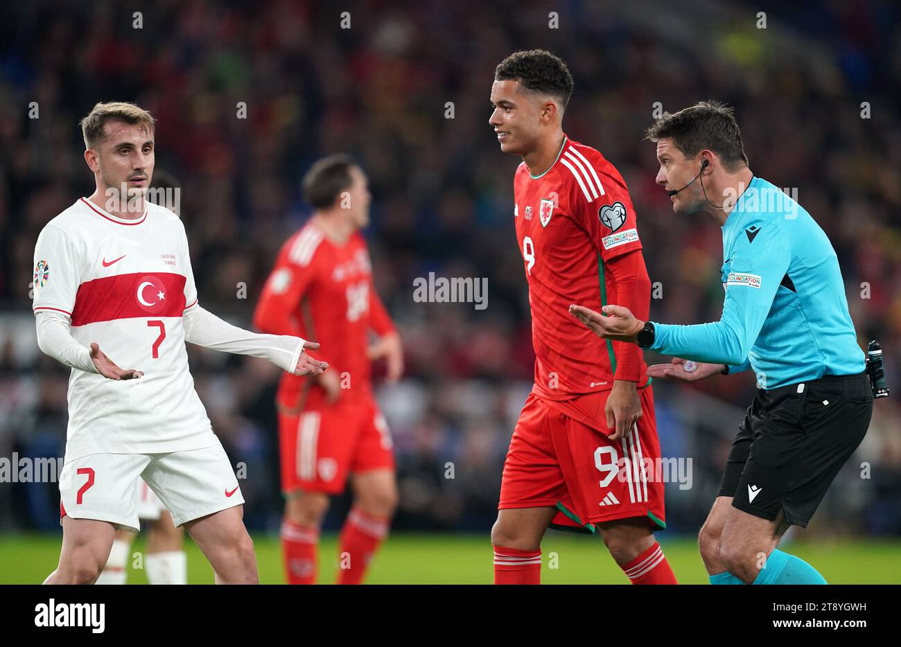 Referee Matej Jug addresses Turkey's Kerem Akturkoglu during the UEFA Euro 2024 Qualifying Group ...