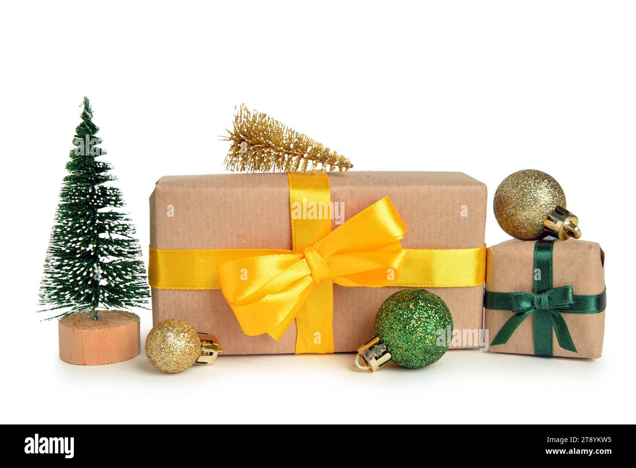 Gift boxes with decorative Christmas trees and balls on white ...