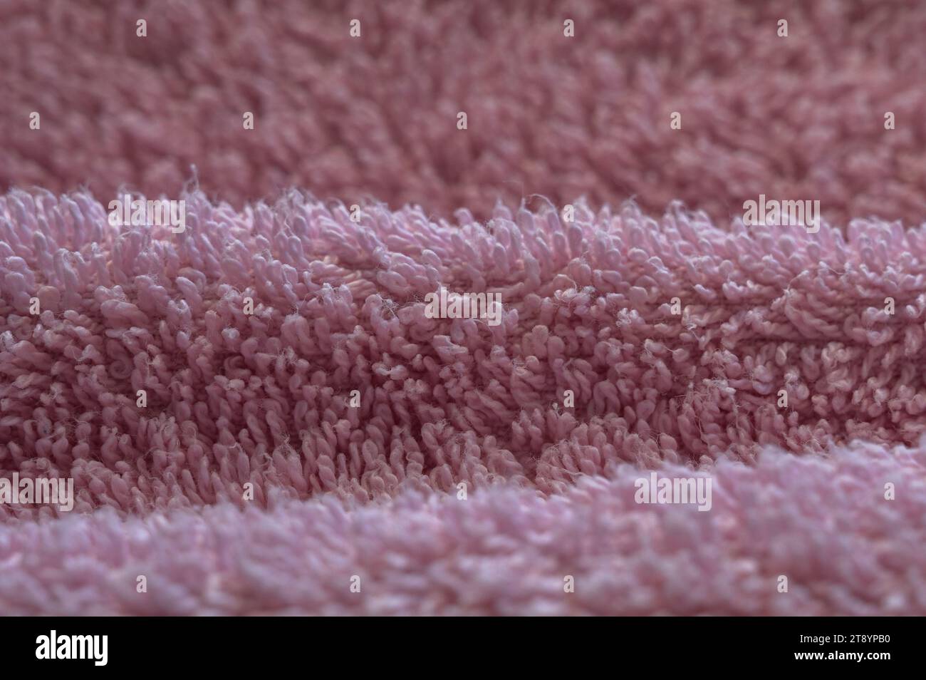 Pink bathroom towel texture close up Stock Photo - Alamy