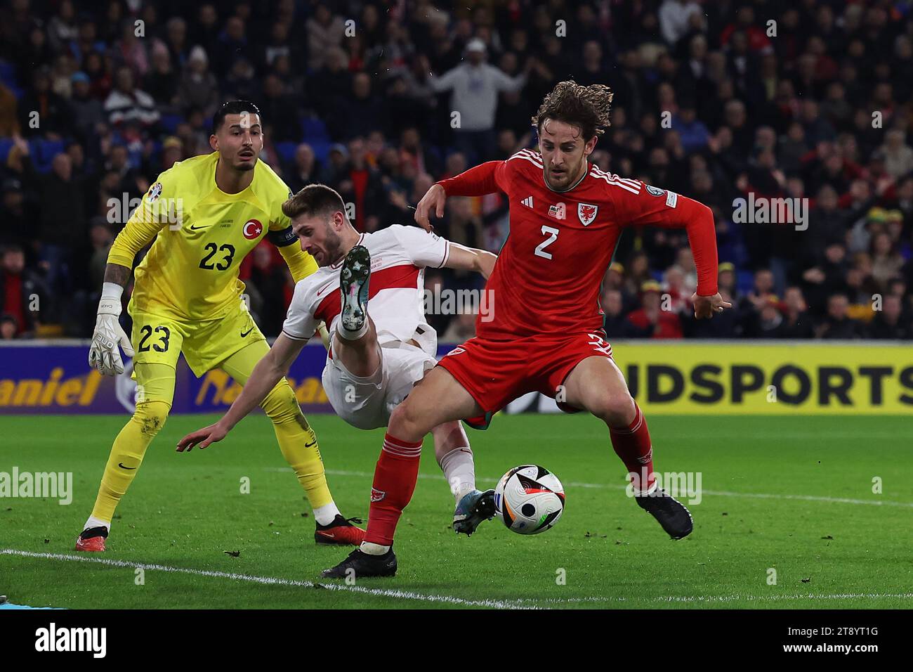 Cardiff, UK. 21st Nov, 2023. Ismail Yusek (16 Turkiye) and Tom Lockyer ...