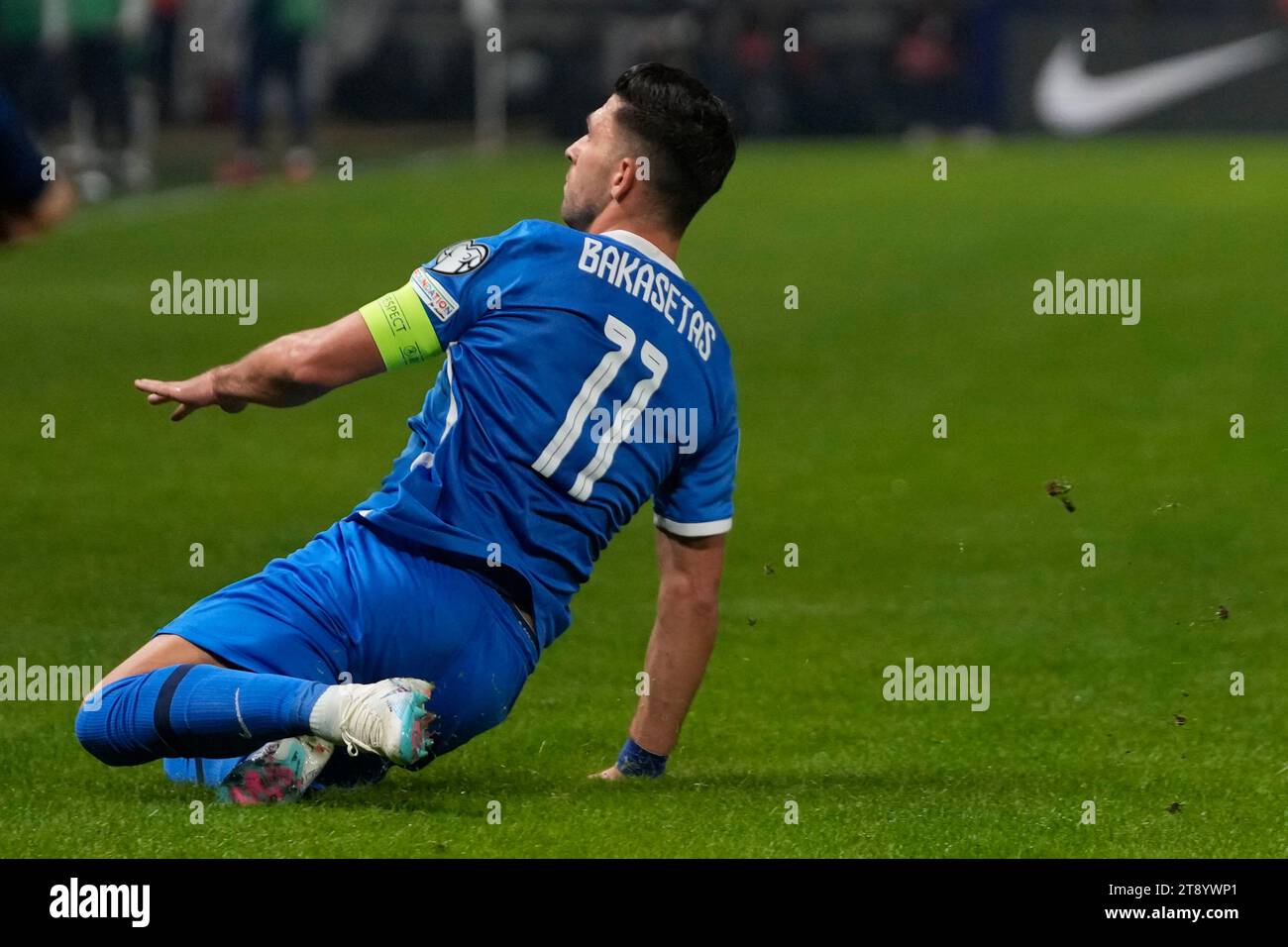 Greece's Anastasios Bakasetas, left, celebrates after scoring during ...
