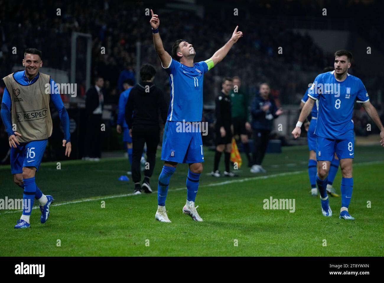 Greece's Anastasios Bakasetas, centre, celebrates after scoring during ...