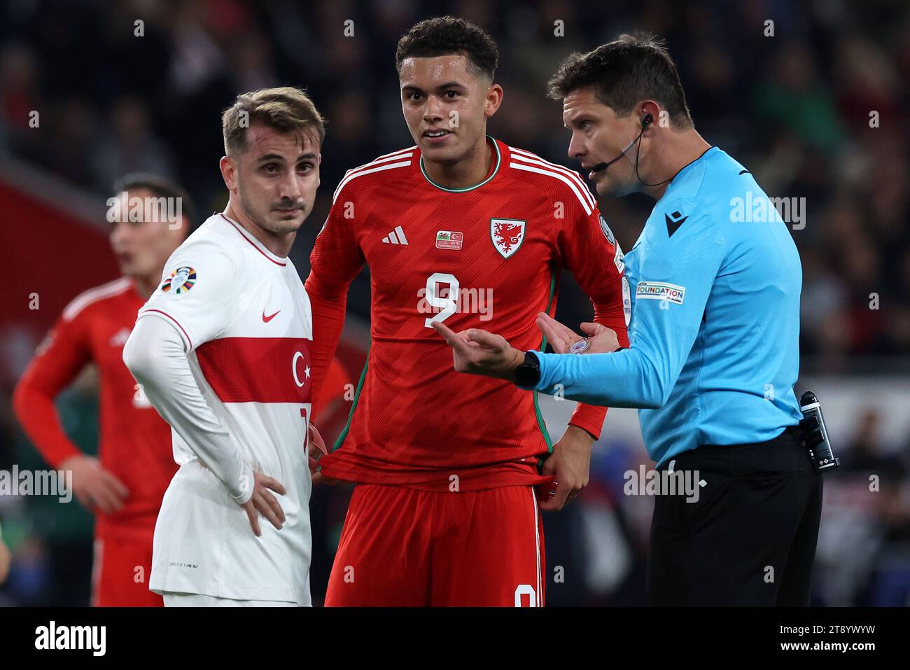 November 21, 2023, Cardiff, Wales: Cardiff, UK. 21st Nov, 2023. Referee Matej Jug speaks to ...